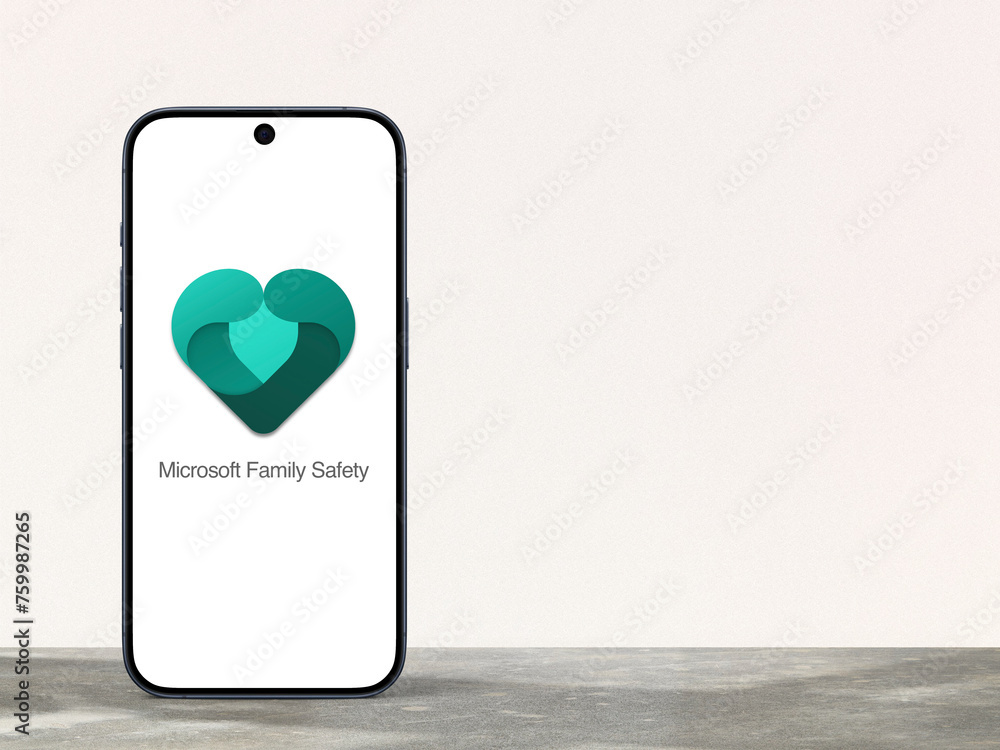 Microsoft Family Safety logo is displayed on a modern smartphone ...