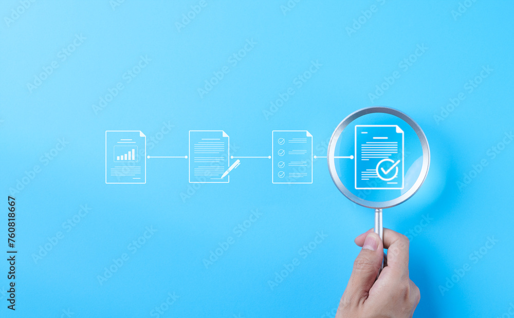 Document review process and quality control concept. Hand holding ...
