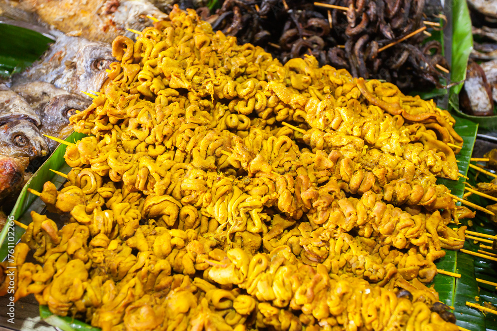 Chicken intestine satay, traditional food from Indonesia. Chicken ...