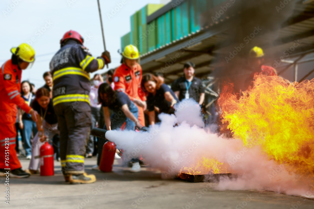 Employees firefighting training, Concept Employees hand using fire ...