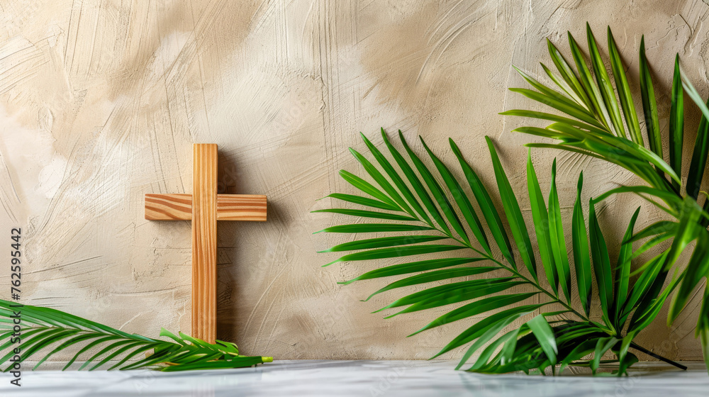 Palm Sunday theme: wooden cross and green palm leaves on background of ...