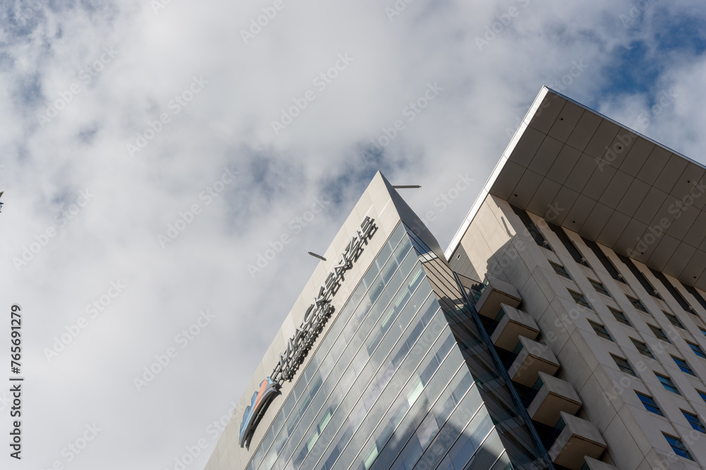 glancing up at building sign for Mackenzie Investments located at 180 ...