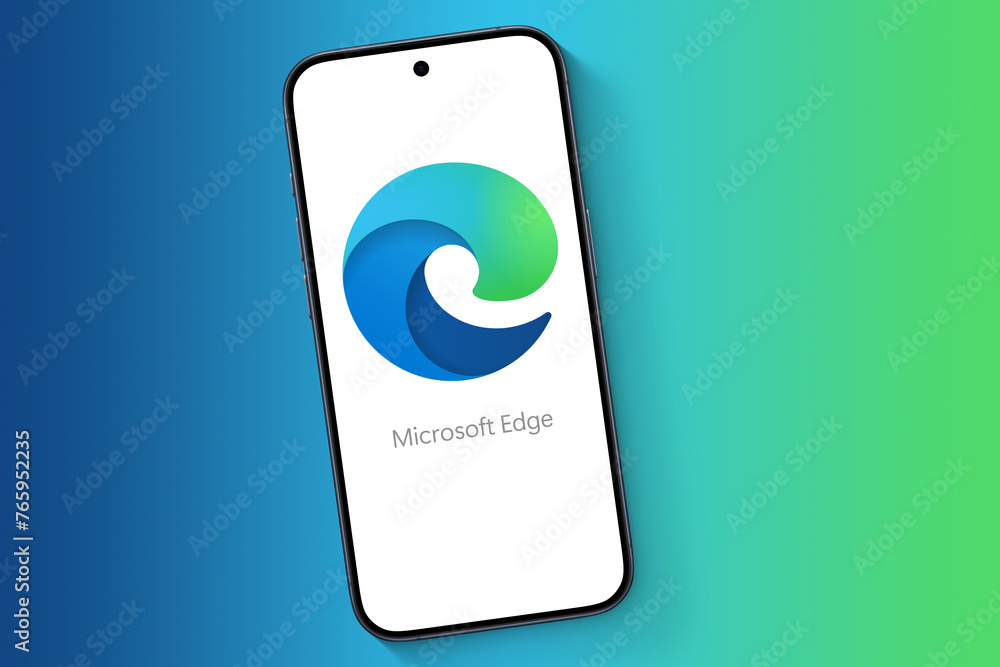 Microsoft Edge logo is displayed on a modern smartphone, colorful ...