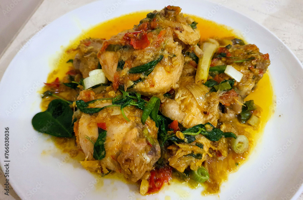 Ayam woku is a traditional dish from the Minahasa or Manado region of ...