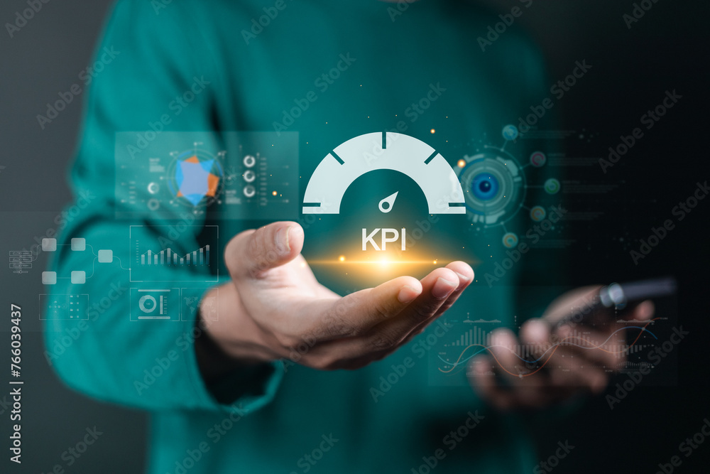 Businessman with data management system on virtual screen to make ...