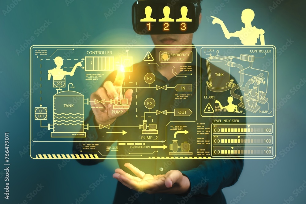 A man is holding a virtual reality controller and pointing at a screen ...