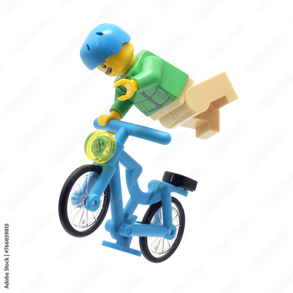 Lego minifigure of stuntman on bicycle closed up. Editorial ...