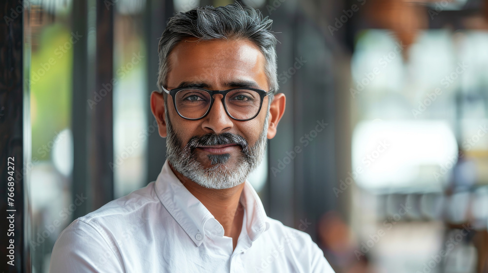 Handsome 45 years old gentle Indian man, wearing glasses, formal slick ...