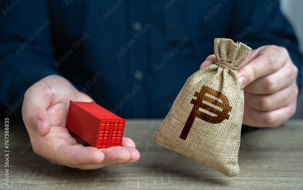 Ship container and philippine peso money bag. Transportation and ...