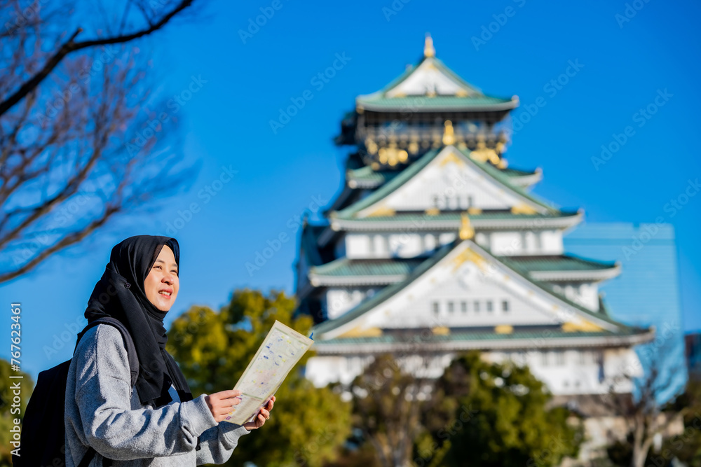 Travel, Muslim travel, Asian Muslim female tourist walking and visitor ...