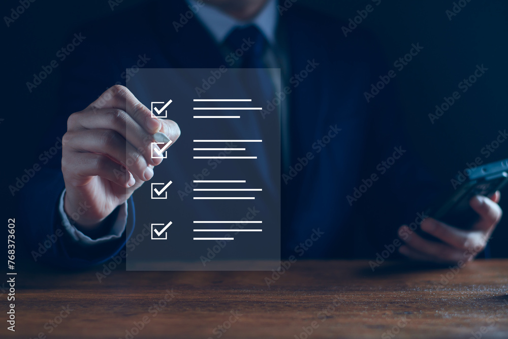 Foto de Stock Check list concept. Businessman tick off questionnaire ...