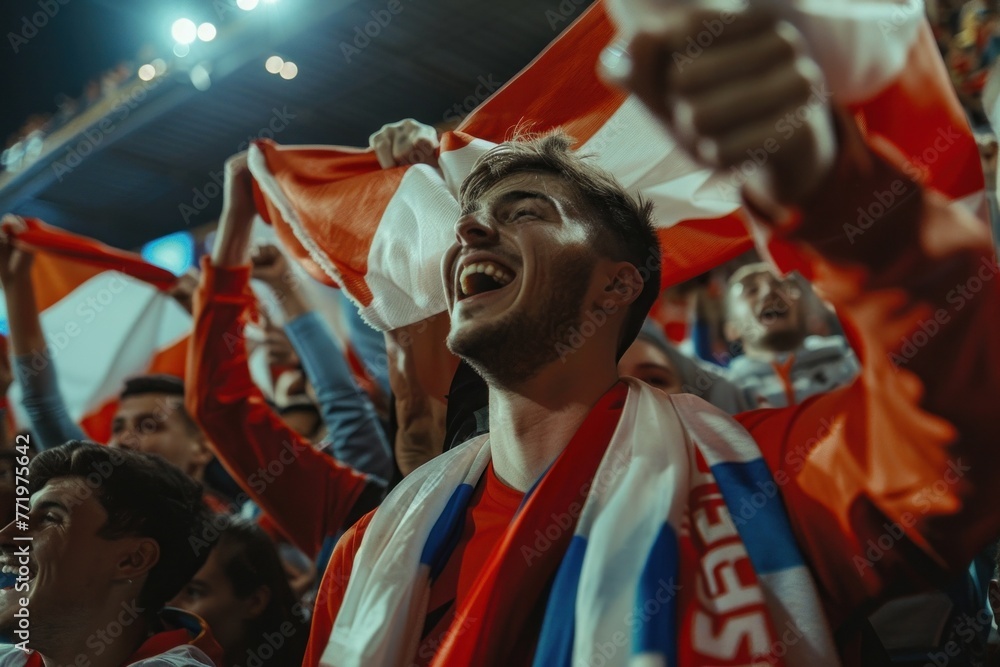 Football fans celebrating victory. Raw emotion and camaraderie among a ...