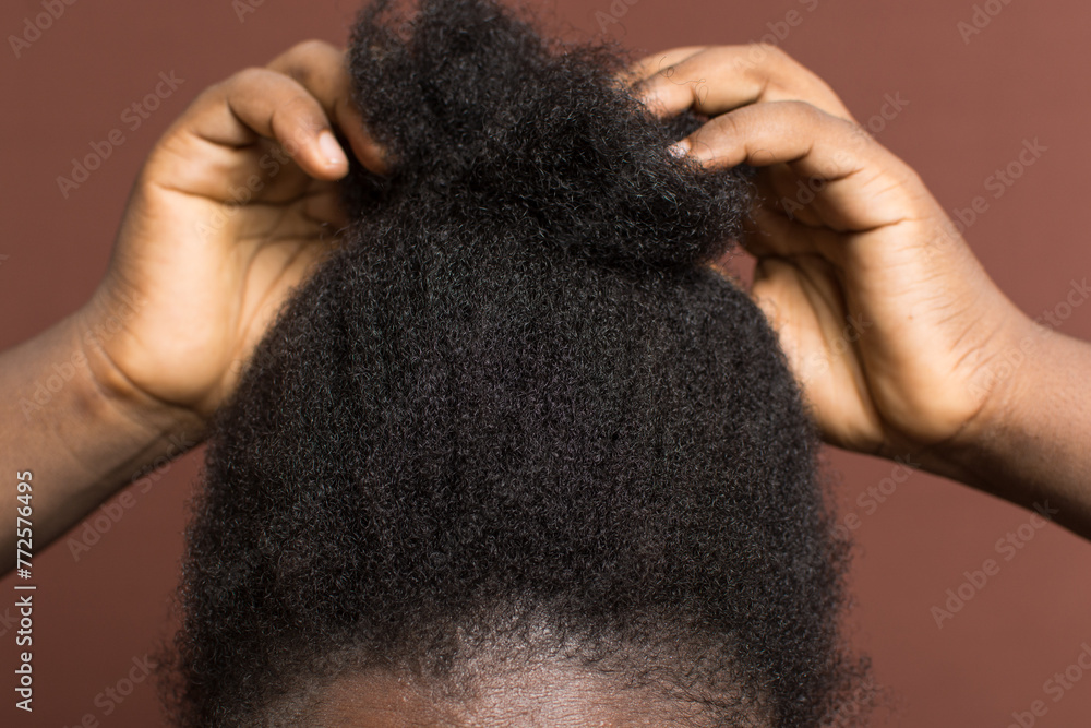 Detangling black afro curly hair with shrinkage, Type 4c hair being ...