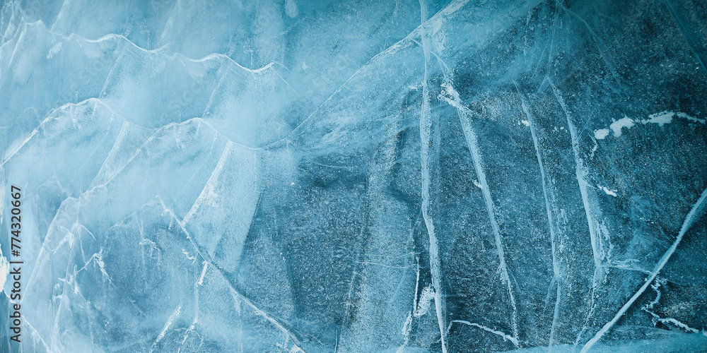Abstract natural ice texture. Freezy ice surface. Blue backdrop with cracks and scratches on ...