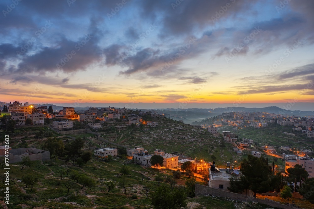 Sunrise in Palestine, a peaceful landscape at dawn. night lights in old ...