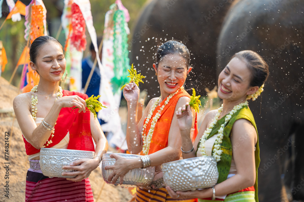 Songkran festival. Northern Thai people in Traditional clothes dressing ...