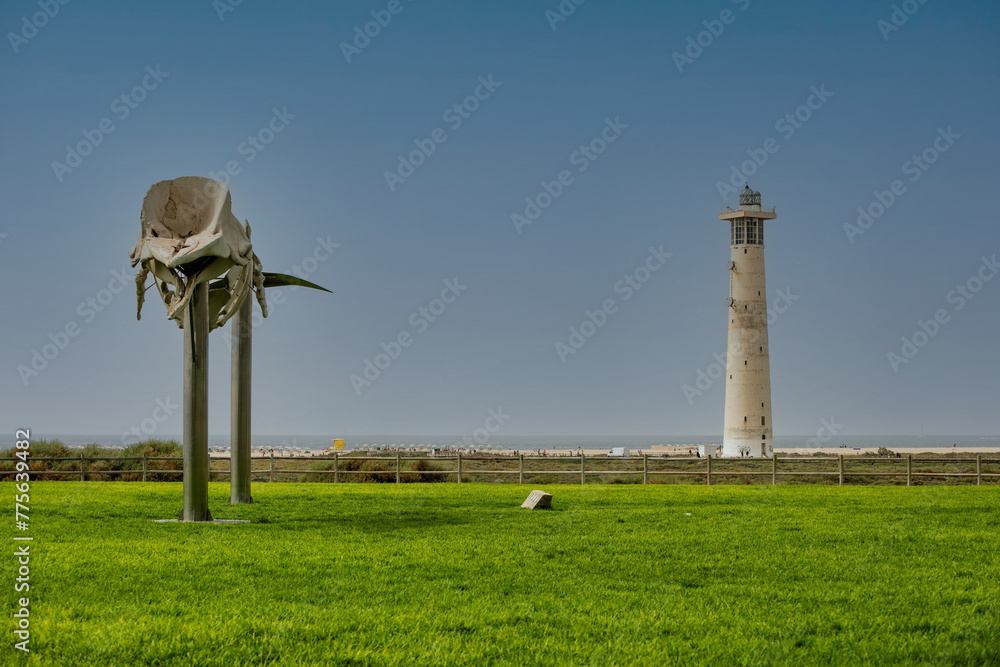 Morro Jable lighthouse and the whale skeleton on the island of ...