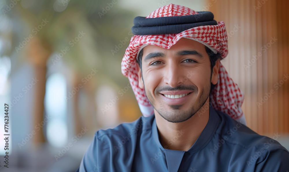 Portrait of sincerely smiling young Arab Ethnicity man wearing ...