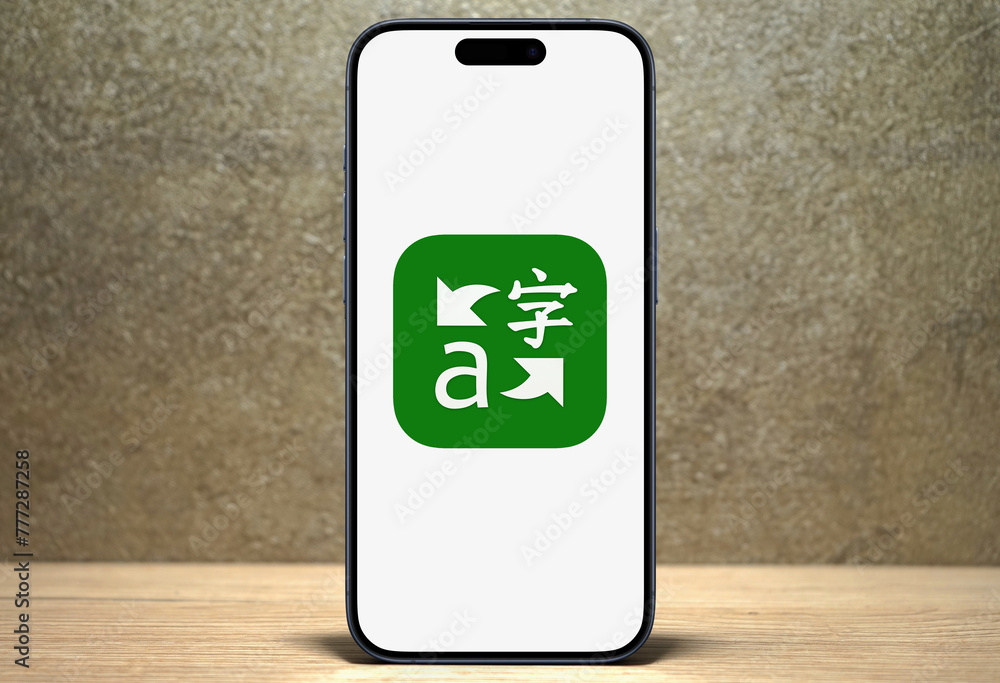 Microsoft Translator App logo is displayed on a modern smartphone ...