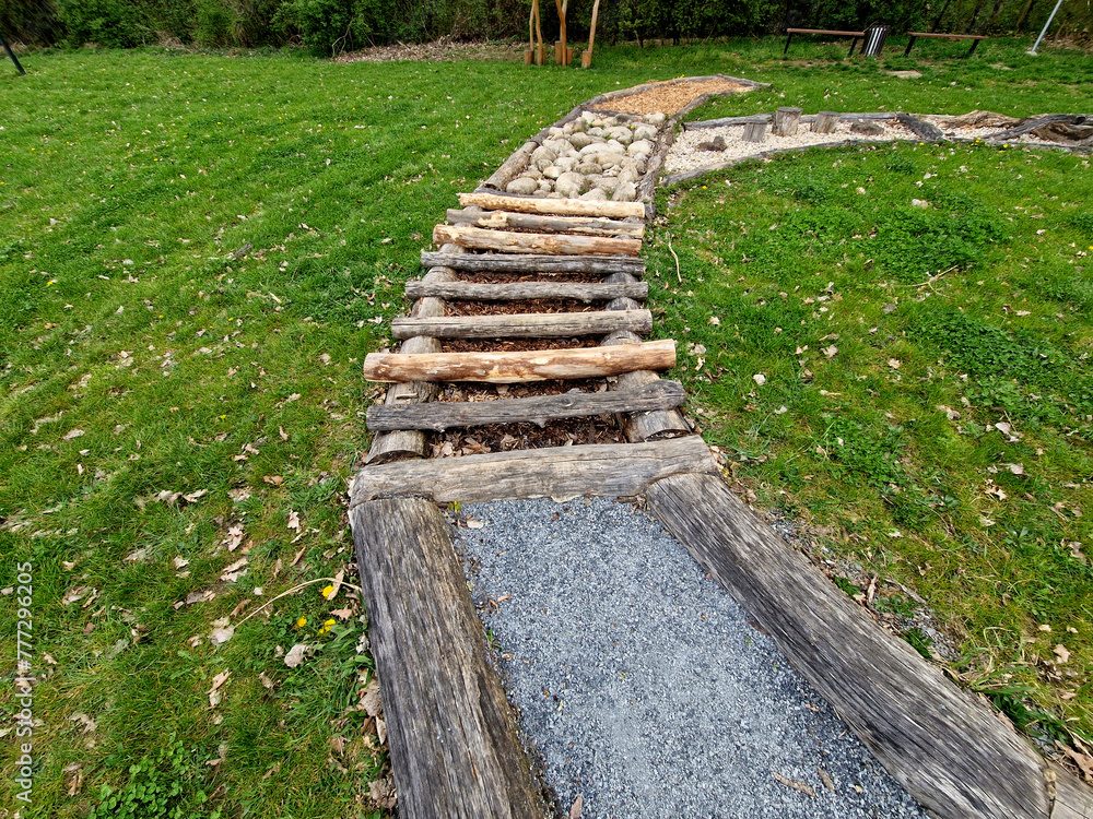 Tactile path for bare feet awakens the senses and uneven endings on the ...