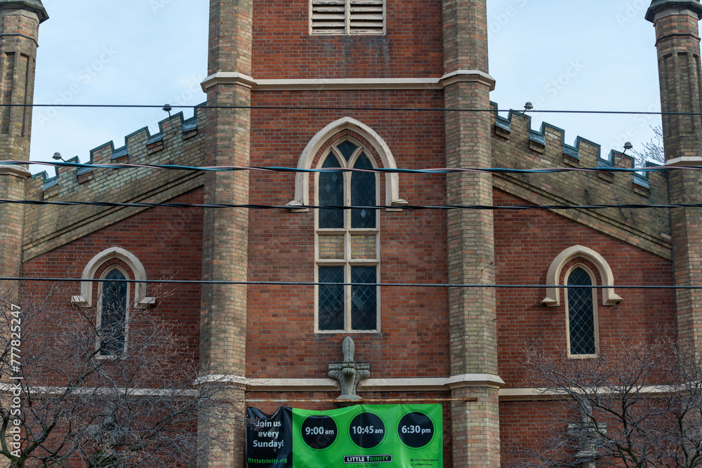 exterior facade and sign of Little Trinity Anglican Church located at ...