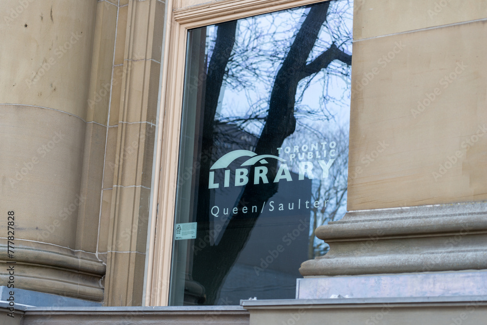 vinyl decal sign on the window at Toronto Public Library - Queen ...