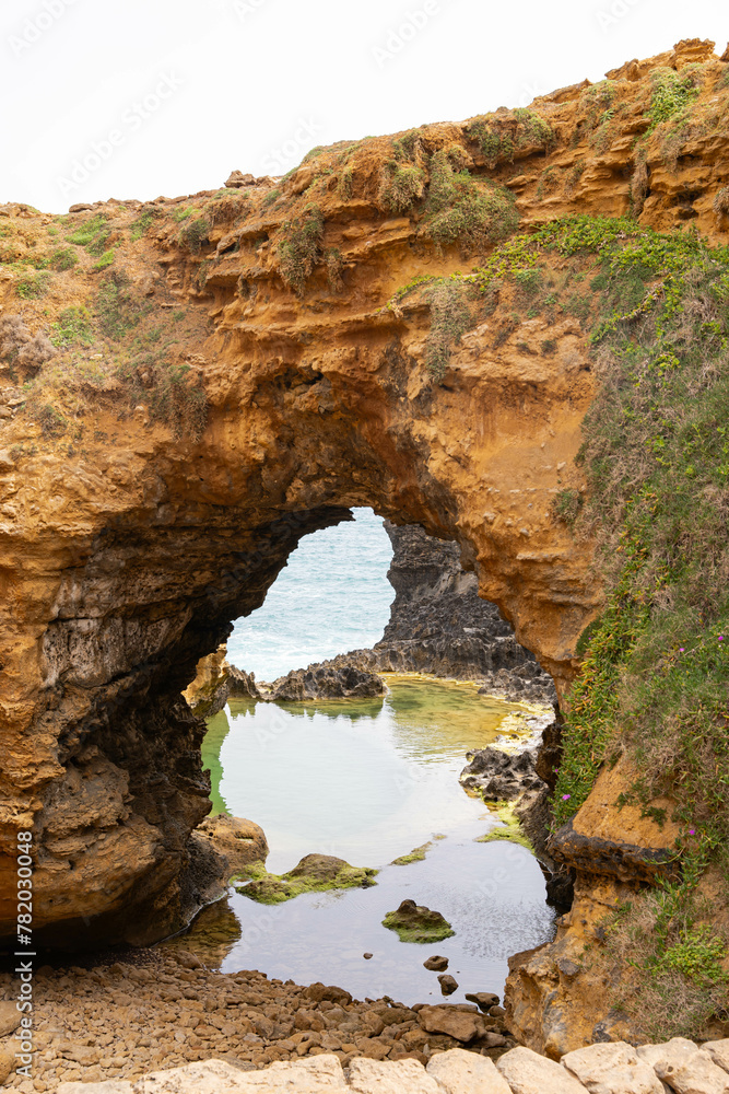 a calm sea at The Grotto; is cave and sinkhole located Loch Ard Gorge ...