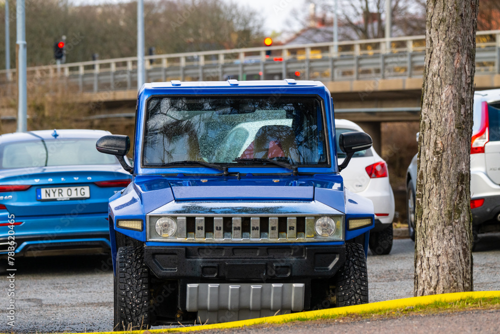 Gothenburg, Sweden - February 23 2024: Blue MEV Mini Hummer HX car at a ...