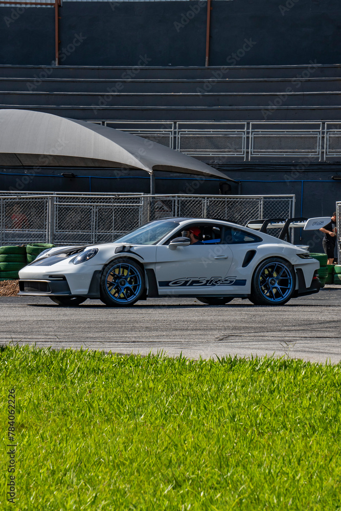 White Porsche 911 GT3 RS on racetrack, Exotic Racecar portrait, High ...