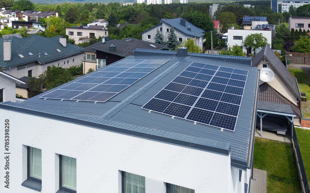 Solar panels on pitched metal roof. Home Renewable Energy Systems ...