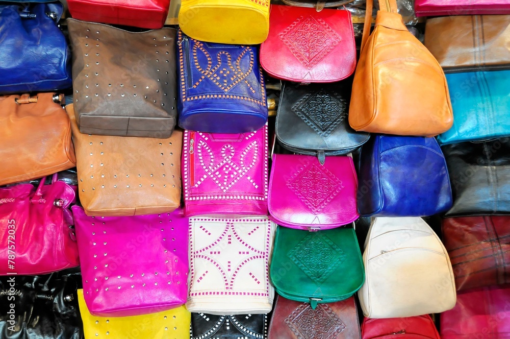 Fez, Bazaar, A wall full of colourful leather handbags in a regular ...