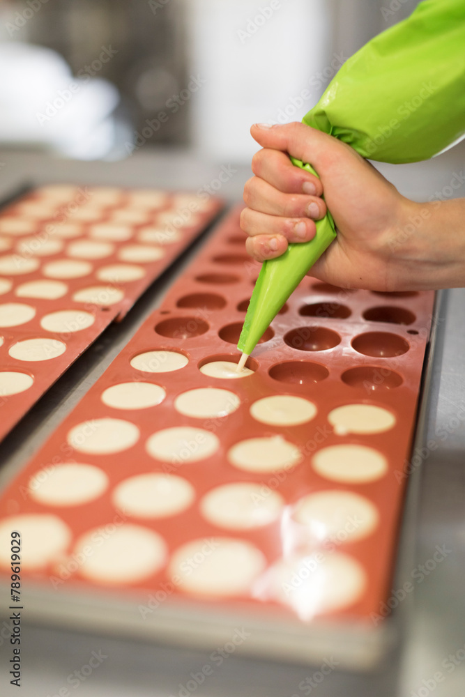 Liquid Dough pouring by pastry bag Stock Photo | Adobe Stock