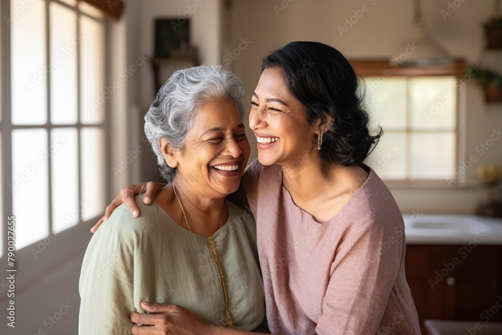 Happy indian elderly mom and young daughter hugging together Stock ...