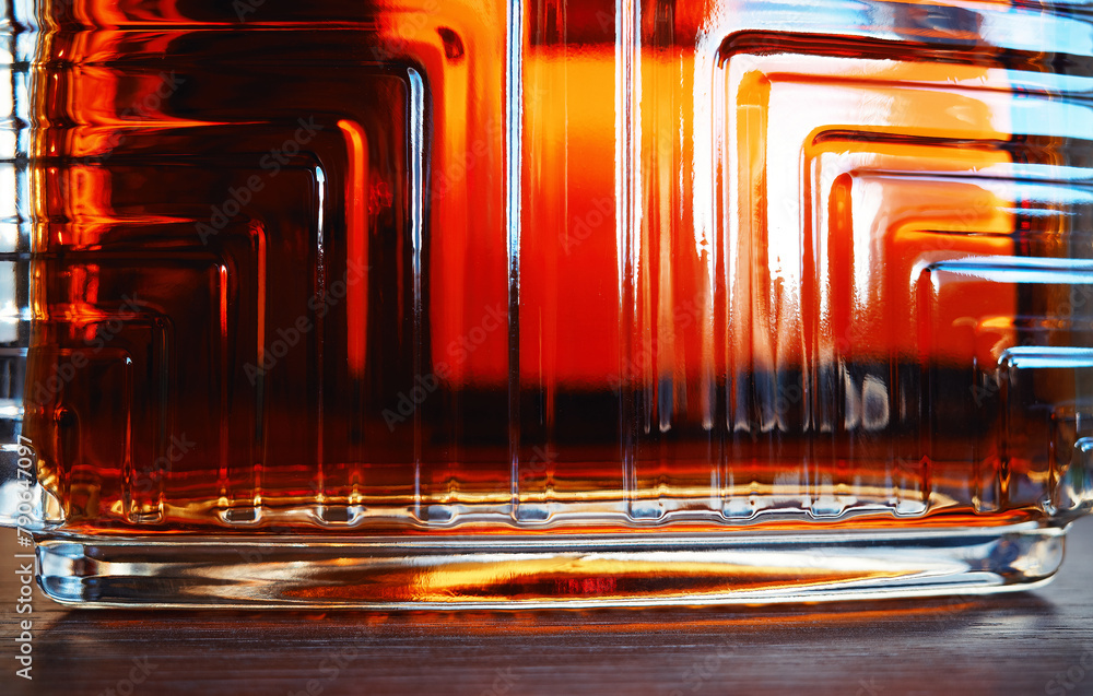Rich glass texture of luxury cognac bottle in detail background Stock ...