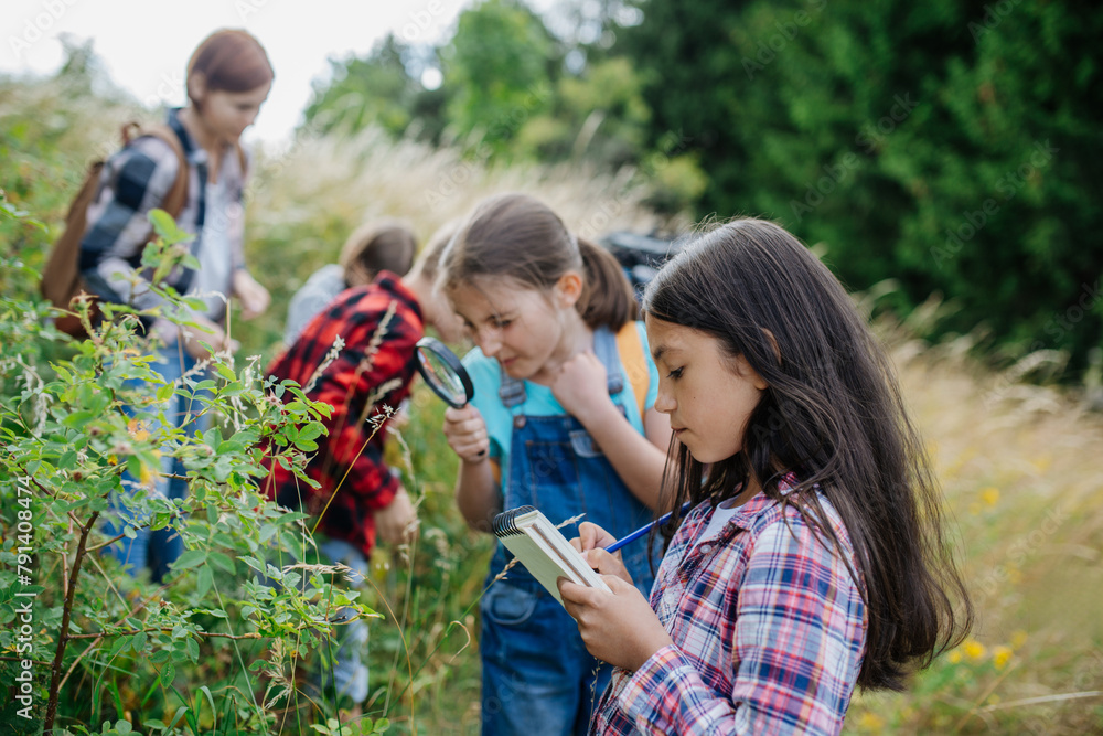 Photo Stock Young students learning about nature, forest ecosystem ...