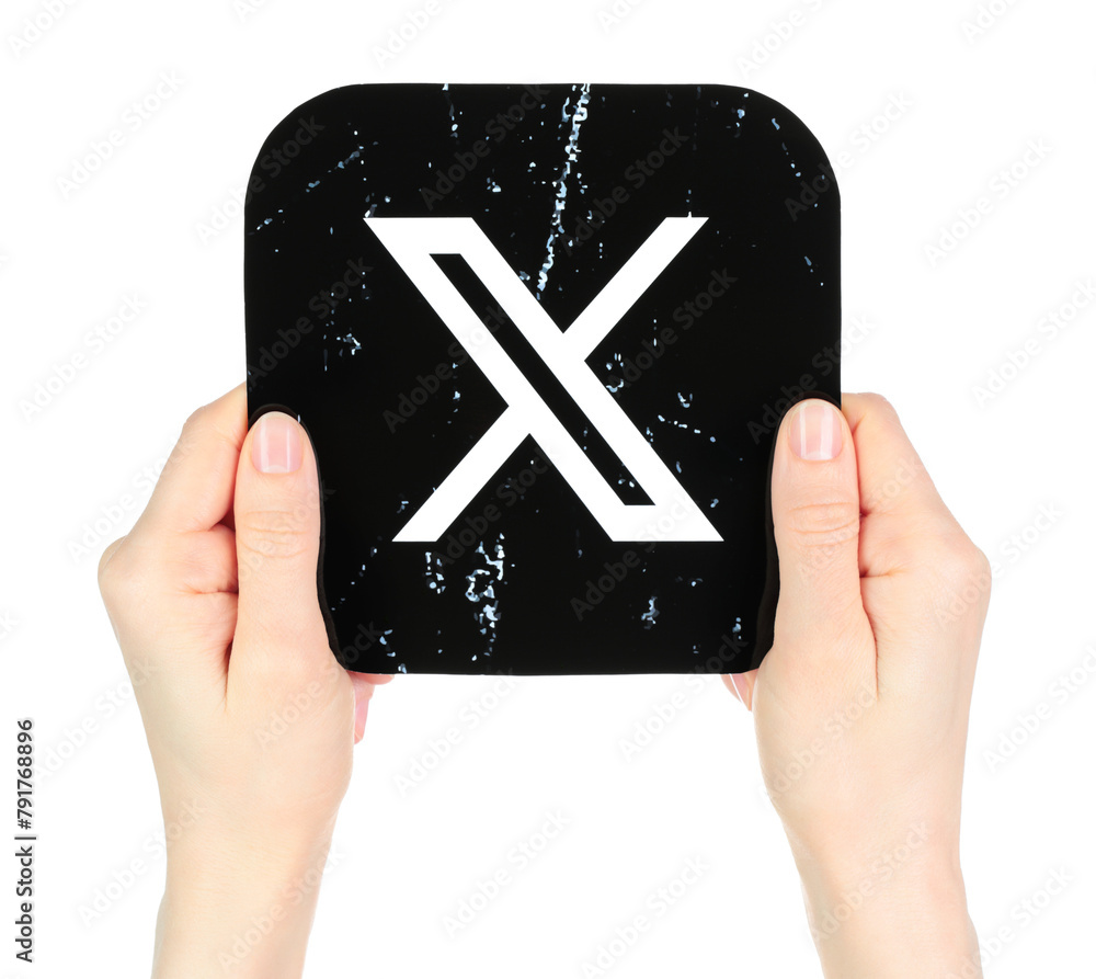 Hands holding paper X - Twitter mobile app icon, on transparent ...