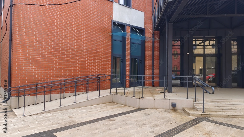 So that people with disabilities can get into a brick building, an ...