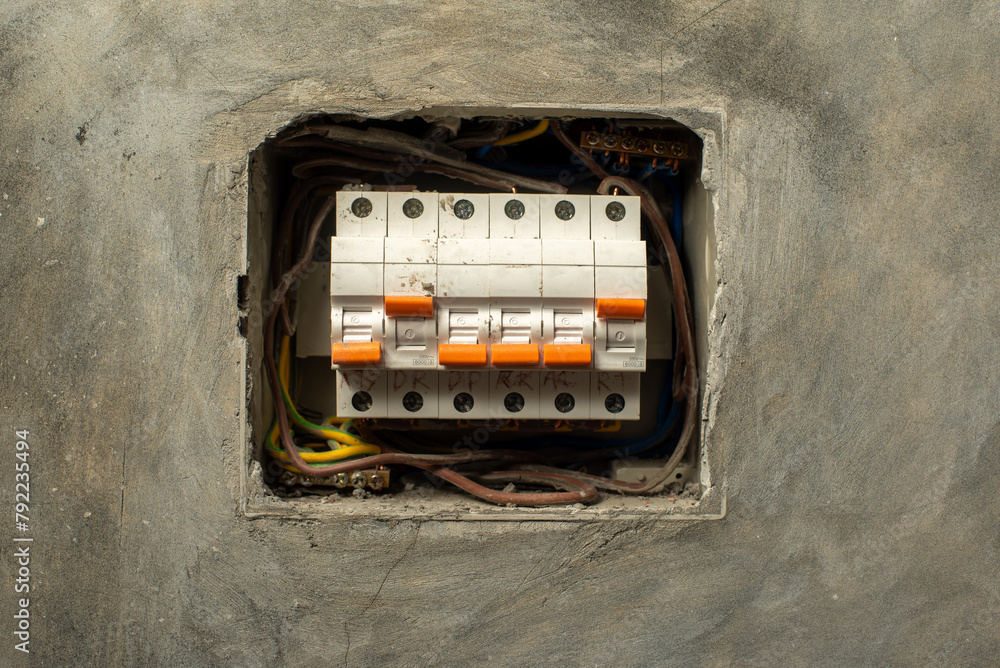 Installation of MCB on an office wall. MCB or Miniatur Circuit Breaker ...