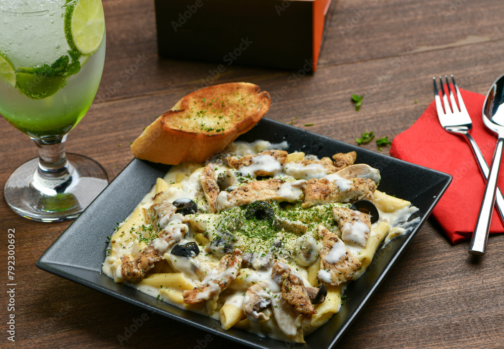 Alfredo Chicken Pasta; A traditional Italian favorite, Tendered pasta ...