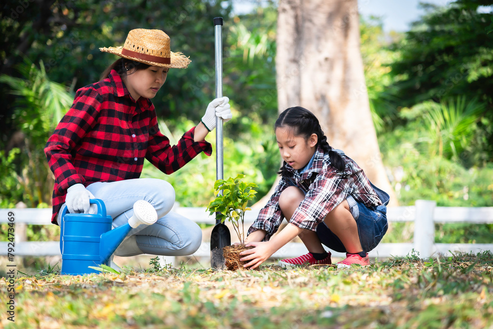 Ecology sapling tree growing up and planting on land. Hands kids Team ...