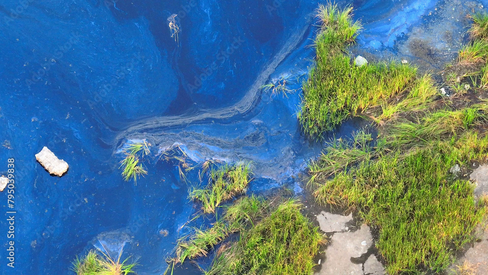 Industrial wastewater flows into surface water, causing pollution ...