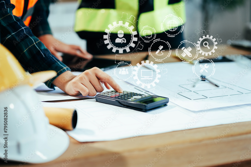 civil engineer or architect business useing calculator about calculate ...