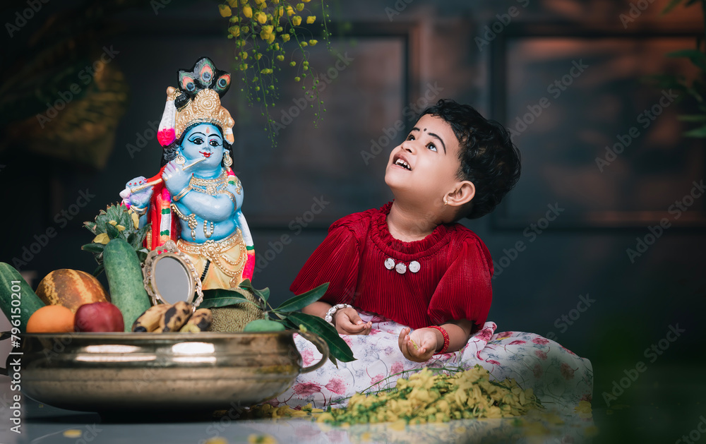 2025 Vishu greeting poster, cute little girl sitting near Vishu kani ...
