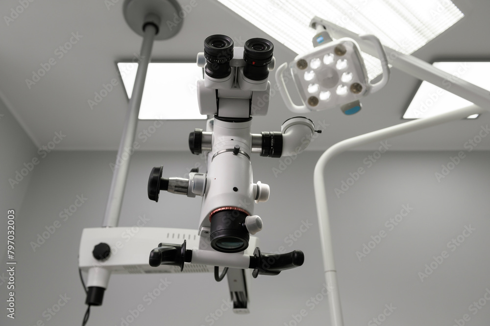 Dental binocular microscope in the dentist's office. Stationary ...
