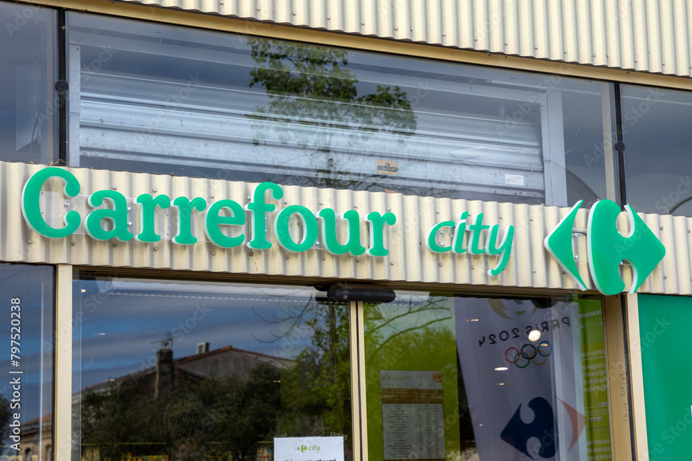Carrefour city shop supermarket sign green logo and brand text facade ...