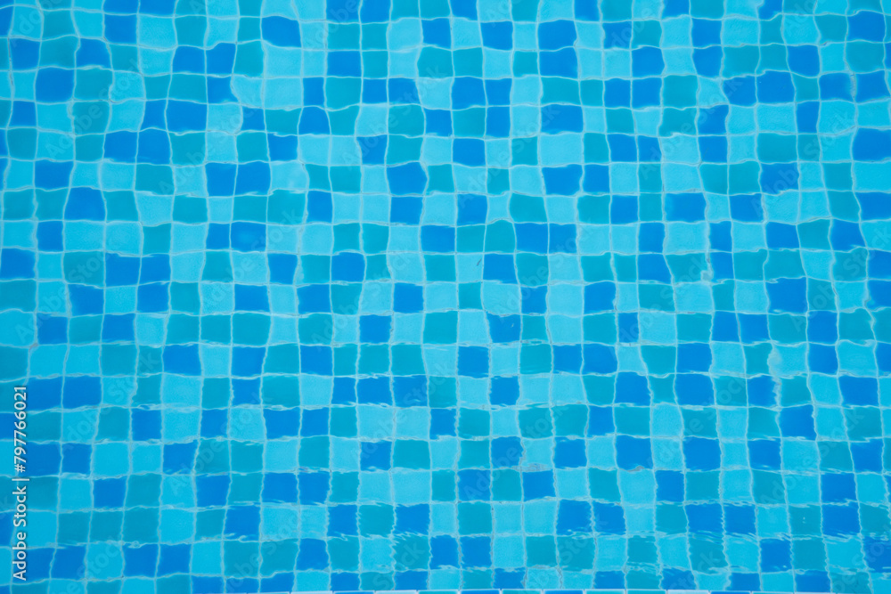 Mosaic square tiles flooring in swimming pool with water ripple waves ...