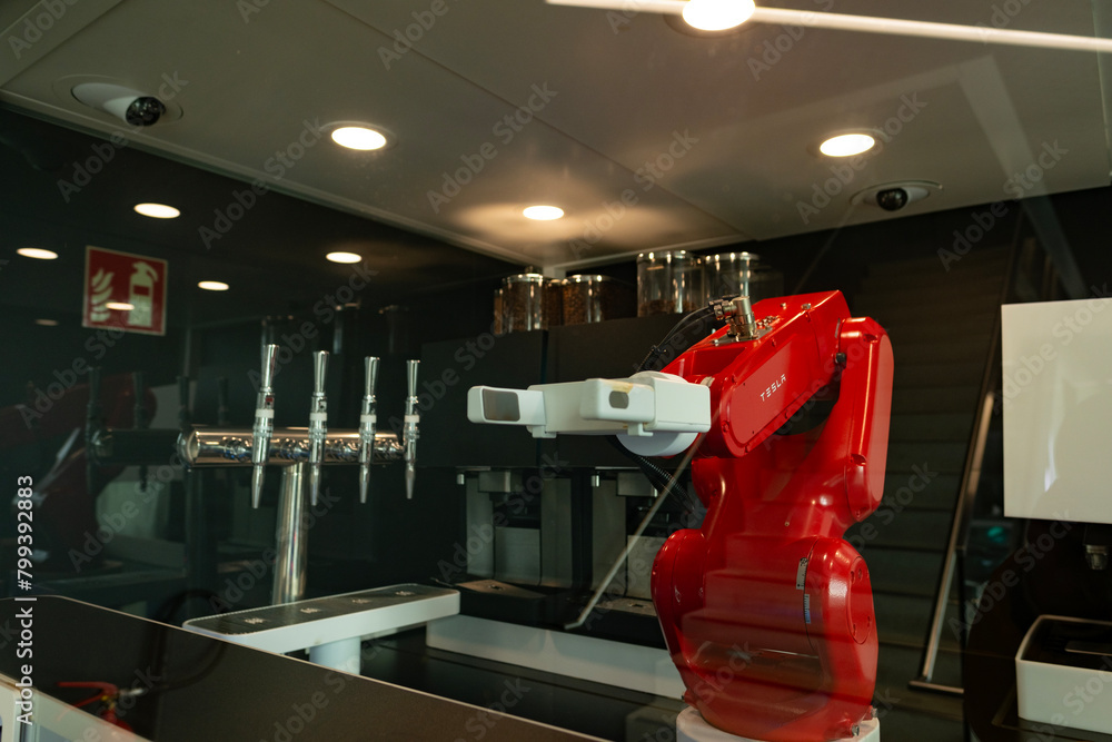 red programmable Tesla robot, robotic mechanical arm with functions to ...