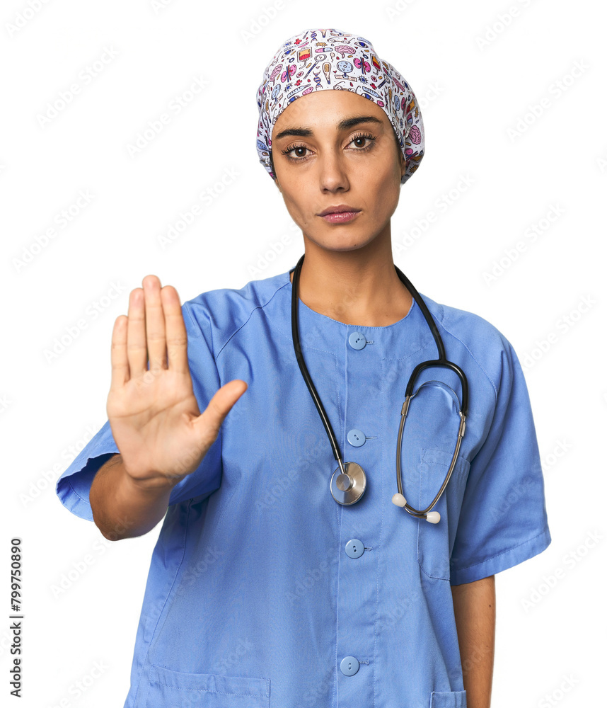 Hispanic nurse in uniform with stethoscope standing with outstretched ...