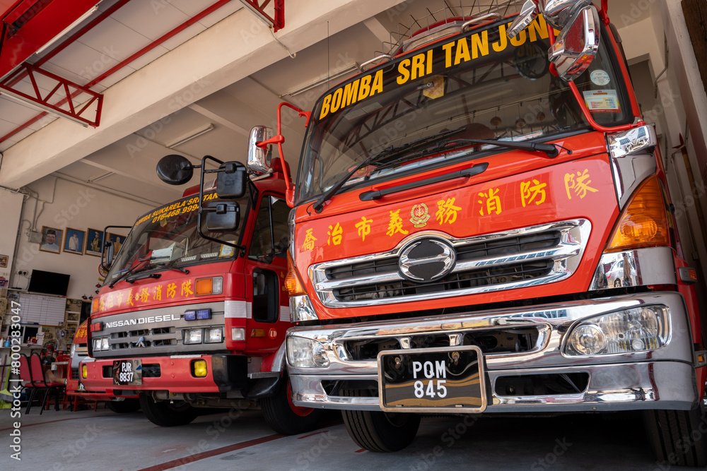 Fire department truks in the historic fire station of Georgetown on ...