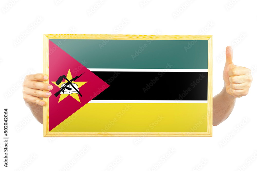 Hands holding a frame with Mozambique flag, celebration or victory ...